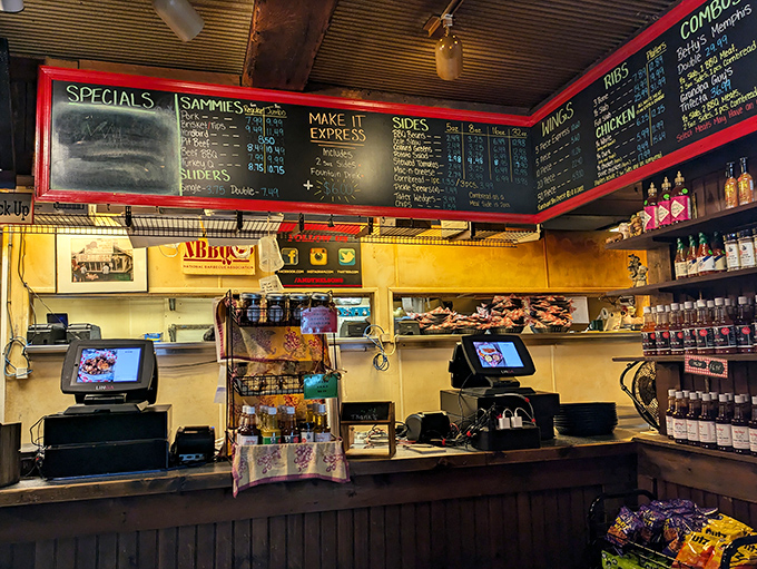 Where barbecue dreams become reality. That menu board is basically a roadmap to happiness with extra napkins.