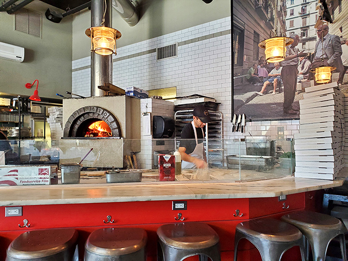 Where pizza magic happens &ndash; the fiery heart of Pizzeria Vetri. That wood-fired oven isn't just equipment; it's the restaurant's soul.