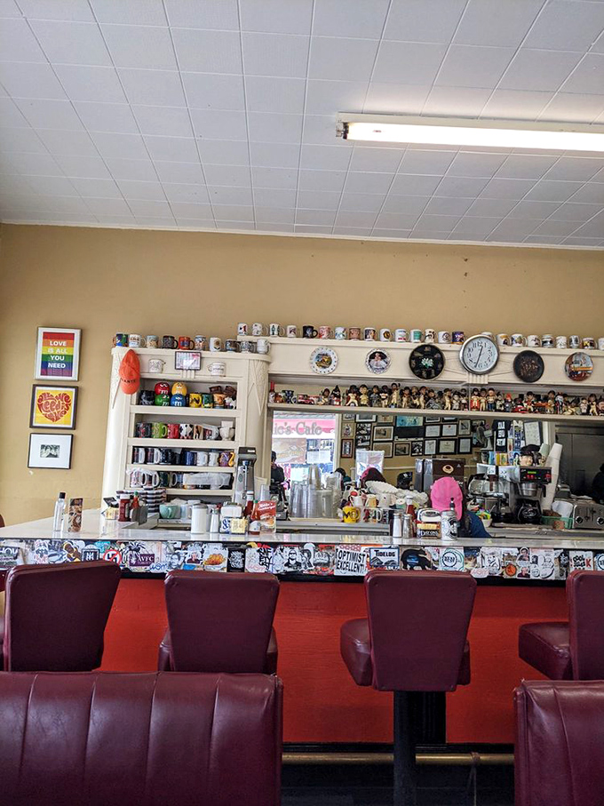 The counter seating and mug collection create the stage where breakfast dreams come true. Each cup tells a story; each seat holds a memory.