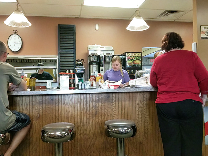 The counter seating&mdash;where regulars perch like birds on a wire, watching the breakfast ballet unfold in the kitchen.