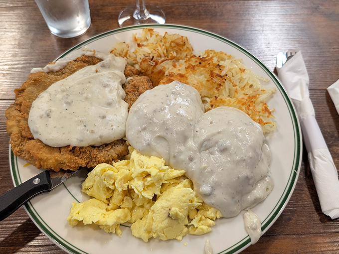 Country fried steak smothered in gravy that could solve international conflicts. Breakfast diplomacy at its finest.