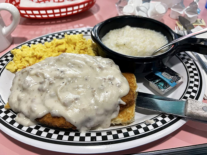 Country fried steak smothered in gravy that could make a vegetarian question their life choices. The scrambled eggs provide moral support.