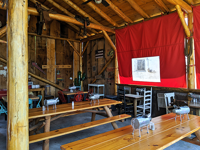 Outdoor dining with rustic flair. These picnic tables have witnessed more food euphoria than a cooking show highlight reel.