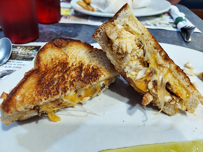 The humble grilled cheese, promoted to executive status with the addition of sweet crab meat—proof that sometimes the best innovations come from combining childhood favorites with grown-up tastes.