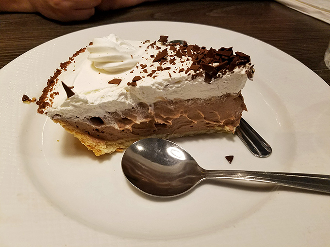 Chocolate cream pie with a cloud of whipped topping &ndash; the kind of dessert that makes you seriously reconsider saving room.