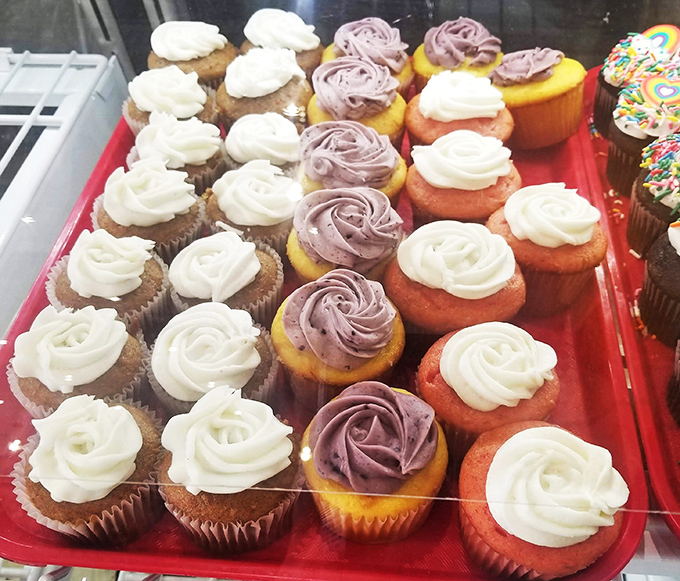 These generously frosted cupcakes sit pretty in their cases, each one a miniature celebration waiting to happen.