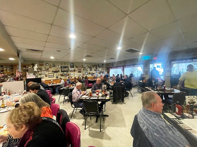 The bustling dining room on a typical morning &ndash; where strangers become temporary tablemates united by the universal language of "pass the syrup, please."