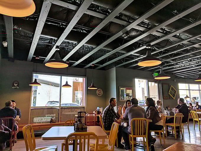 Happy diners sharing stories and breakfast&mdash;the true measure of any great morning eatery isn't just the food, but the community.