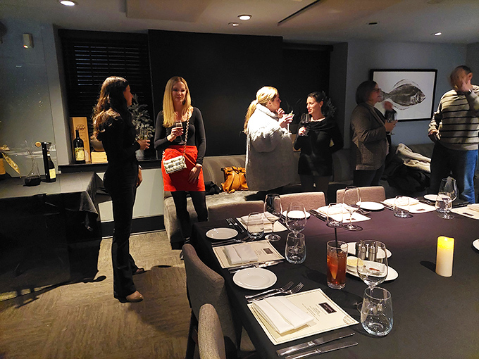 The dining room buzzes with conversation and clinking glasses – where food becomes the centerpiece of human connection.