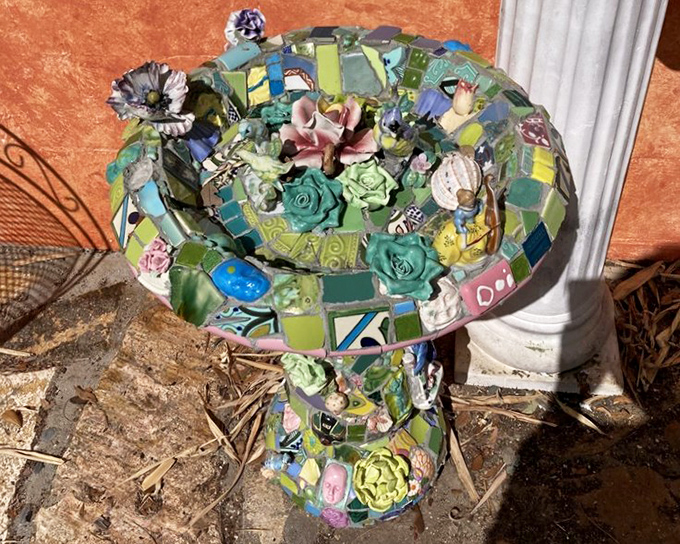 A birdbath that birds probably approach with caution, thinking, "Is this really for us or is it modern art?" Why not both?