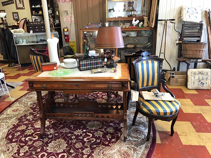 This elegant desk and striped chair pairing isn't just furniture&mdash;it's a statement piece waiting to transform your home office into a space Don Draper would approve of.