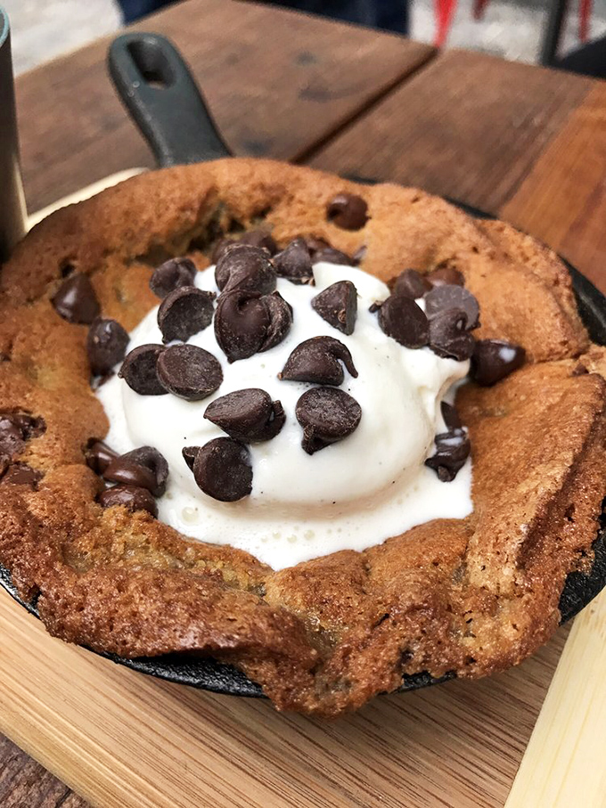A warm cookie skillet that whispers, "You absolutely have room for dessert," and somehow, miraculously, you do.