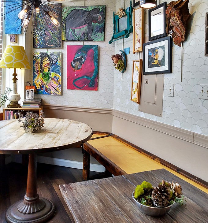 A cozy nook where time slows down just enough to savor every bite. Those wooden tables have witnessed countless moments of pure joy.