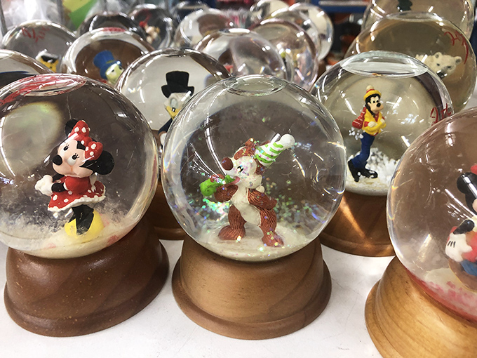These aren't just snow globes&mdash;they're tiny worlds of wonder where Disney characters are forever caught in moments of joy.
