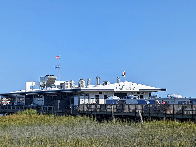 From a distance, Fleet Landing appears to float above the marsh grass&mdash;a white naval structure that traded military precision for culinary excellence.