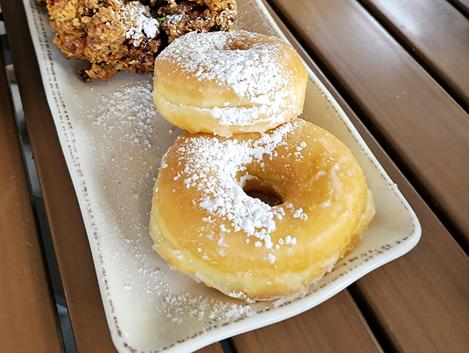 These aren't just donuts&mdash;they're pillowy portals to childhood joy that somehow taste even better when you're old enough to pair them with bourbon.