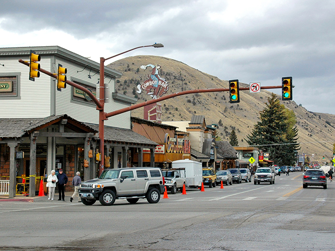 Main street stretches toward the mountains, reminding everyone that civilization here exists by nature's generous permission only.