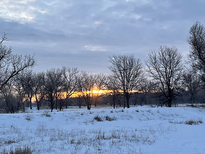 Winter sunsets in Scottsbluff paint the sky in golden hues, a daily show that costs nothing but reminds you that the best things in life are actually free.
