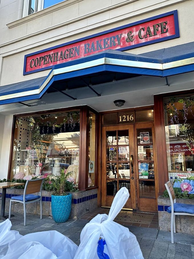 The entrance beckons like a portal to pastry paradise &ndash; those wooden doors might as well have "Abandon Diets, All Ye Who Enter Here" inscribed above.