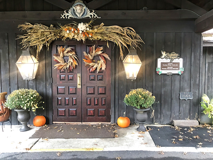 The entrance says it all &ndash; rustic elegance with seasonal touches. Those carved wooden doors have welcomed food lovers for generations.