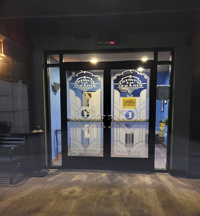 Art deco entrance doors that feel like a portal to a simpler time when dinner was an event and steaks were the main attraction.