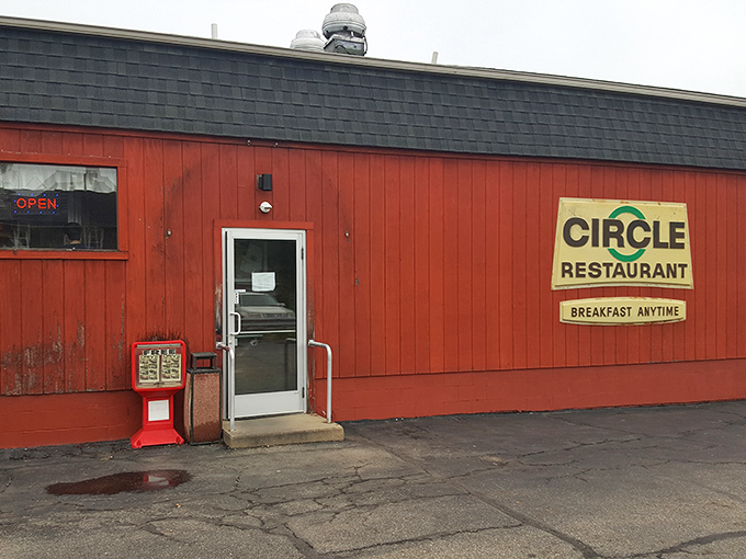 The simple red exterior with its straightforward "CIRCLE RESTAURANT" sign makes a bold promise: what happens inside these walls will be anything but ordinary.
