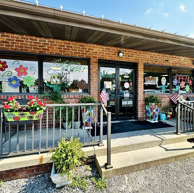 Colorful window paintings and flower boxes welcome visitors to this community gathering spot where good food and conversation have equal billing on the menu.