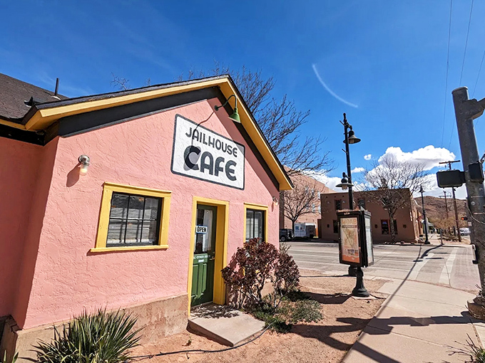 The corner entrance beckons like an old friend, promising that inside these salmon-pink walls lies the cure for whatever ails you.