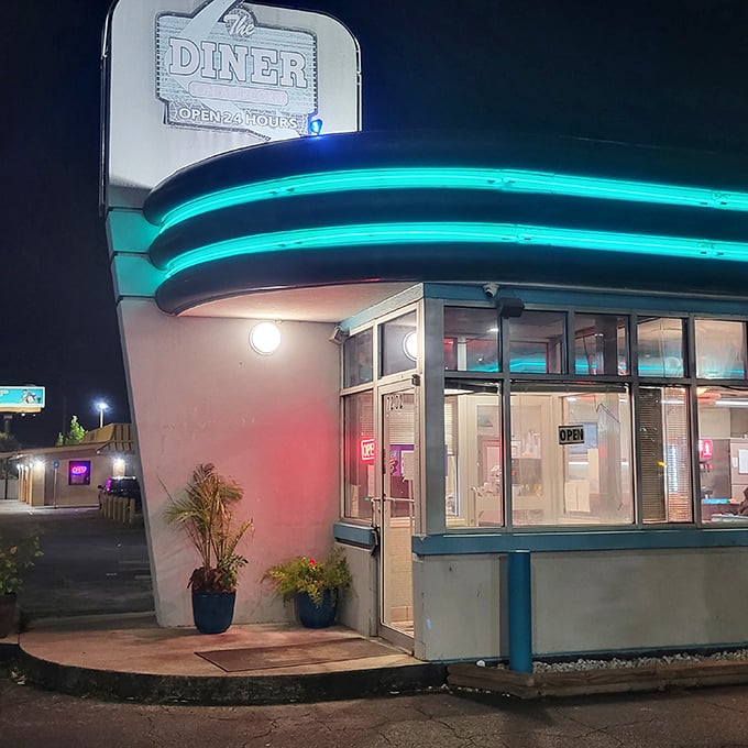 When darkness falls, those neon lights transform this corner into Savannah's brightest spot for midnight cravings.