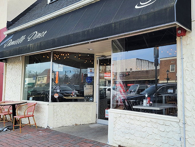 Morning light streams through large windows, illuminating the inviting entrance where breakfast dreams come true seven days a week.