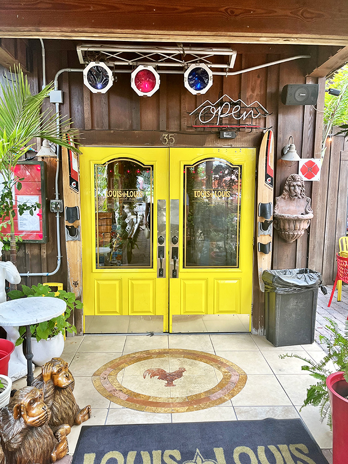 Those yellow doors might as well be portals to happiness, flanked by quirky sculptures that seem to say, "You're going to love it here."