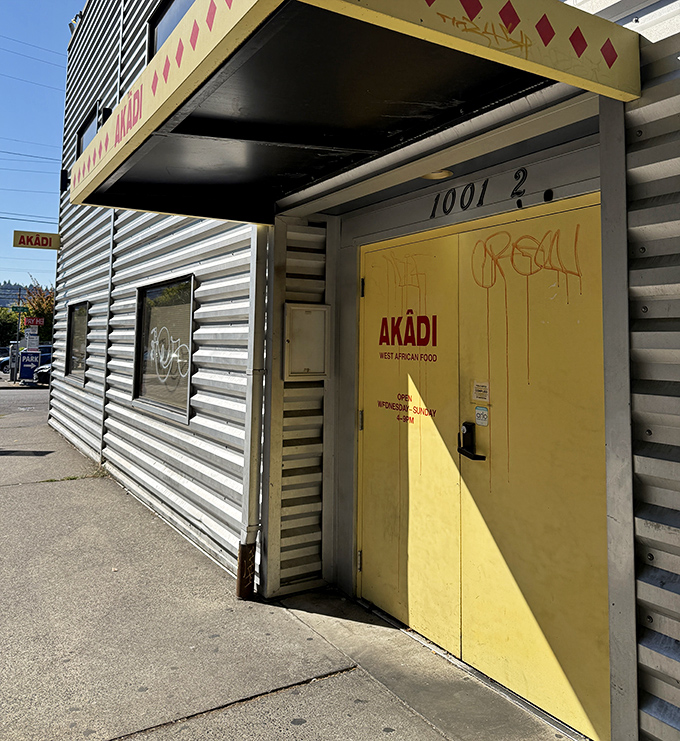 The sunshine-yellow entrance door is Portland's portal to West Africa &ndash; no passport required, just an appetite for adventure.