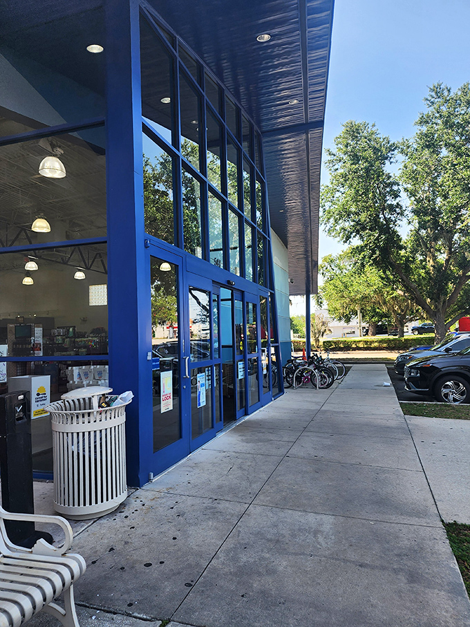 The welcoming facade offers a glimpse of the treasure cave within&mdash;Florida sunshine reflecting off those signature blue accents.