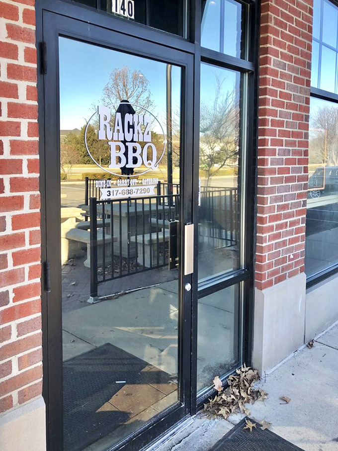 The entrance beckons with promises of smoky treasures within. That logo on the door isn't just branding—it's a portal to flavor country.