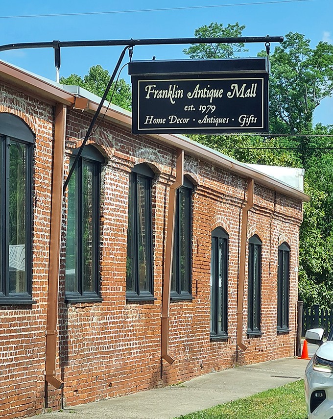 The classic brick exterior houses decades of memories and merchandise. That sign has been directing treasure hunters since bell-bottoms were unironically cool.