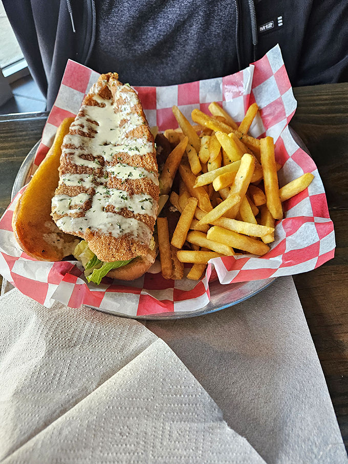 This fish sandwich isn't just a meal&mdash;it's an architectural achievement. Golden-fried fillet, crisp lettuce, and sauce that doesn't quit, all nestled in a pillowy bun.
