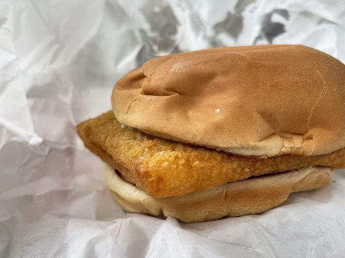 The fish sandwich—humble in appearance but mighty in flavor—proves Bobo's excellence extends well beyond their famous beef offerings.