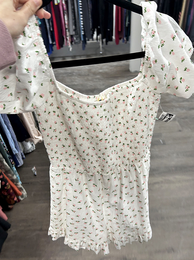 A delicate floral dress with puff sleeves and smocking waits for its next spring adventure—romantic style that won't break the bank.