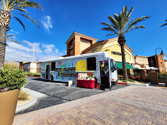 Even food trucks get the luxury treatment at Desert Hills, offering gourmet bites between shopping sprees under the watchful gaze of palm trees.