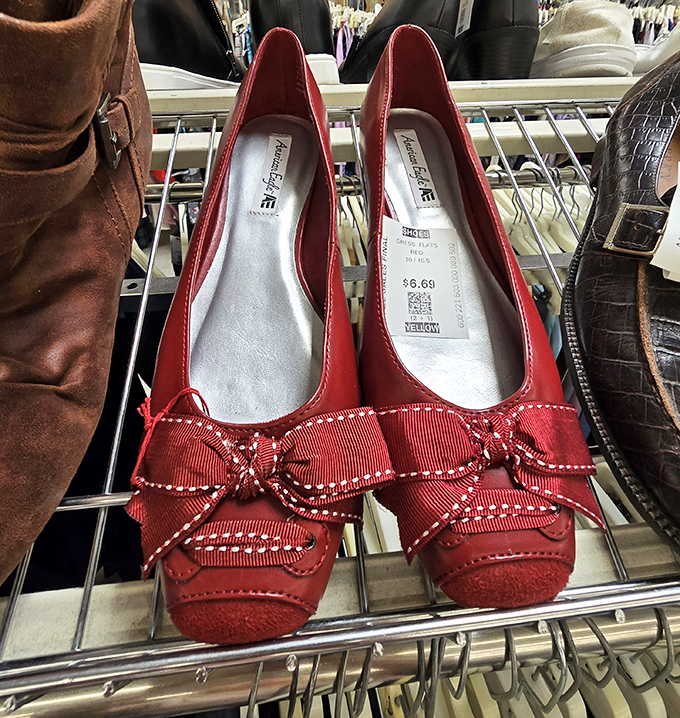 Red shoes with decorative bows sit waiting for their Dorothy moment, ruby slippers for the budget-conscious fashionista.
