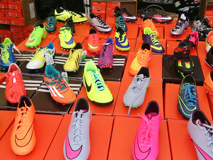 Soccer stars are born at the swap meet! These neon cleats could turn any weekend warrior into the most visible player on the field.