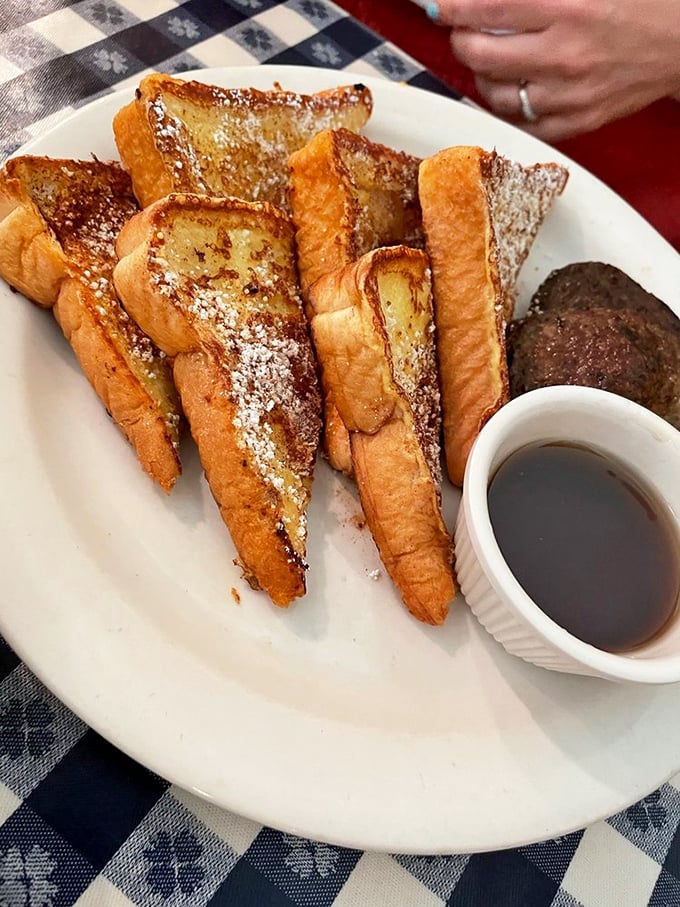 French toast that's crossed the line from breakfast to dessert, dusted with powdered sugar like the first snow of winter.