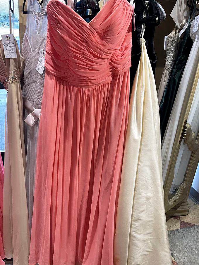 Formal gowns hanging like patient debutantes&mdash;ready to transform an ordinary evening into something from a fairy tale, without the fairy tale price.