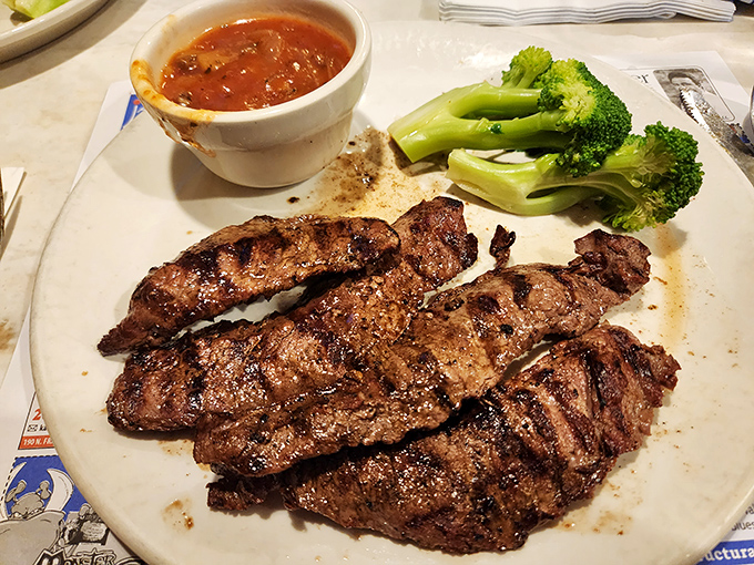 Steak that needs no introduction &ndash; just a moment of respectful silence before diving in. Perfectly grilled beef with sides that know their supporting role.