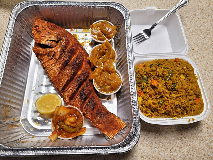 That red snapper stretches across the container like it's showing off, and honestly, with those grill marks, it's earned it.