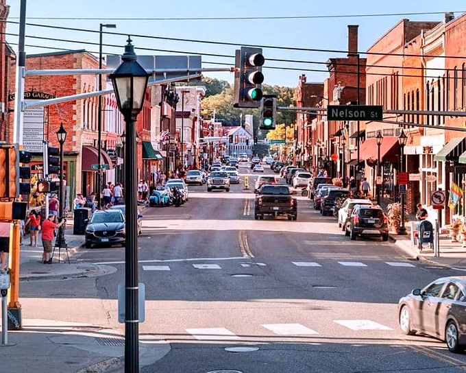 Historic downtown's warm brick buildings glow in the afternoon sun, creating the kind of Main Street that makes you wonder if you should open that bookstore you've always dreamed about.