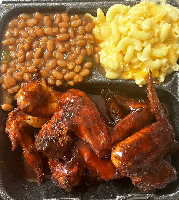 Barbecue wings with that perfect lacquer of sauce, mac and cheese, and beans&mdash;a holy trinity that makes you believe in culinary divinity.
