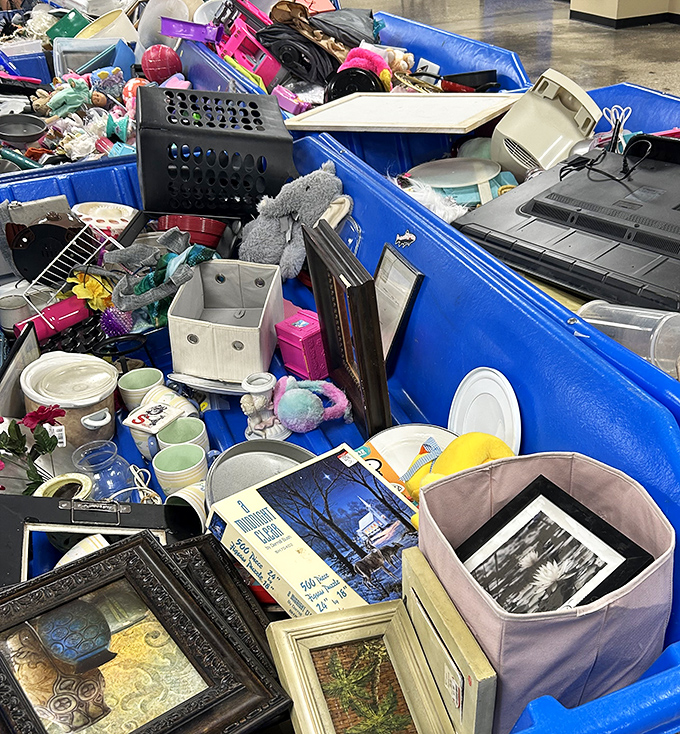 Kitchen essentials, frames, and random household treasures jumbled together like the world's most affordable variety show waiting backstage.