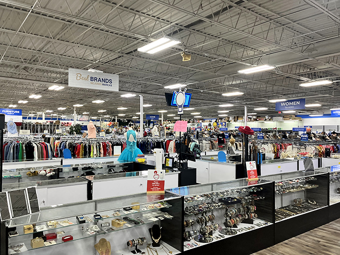 Department store organization meets thrift store prices. The jewelry counter gleams with possibility while clothing sections beckon in the background.