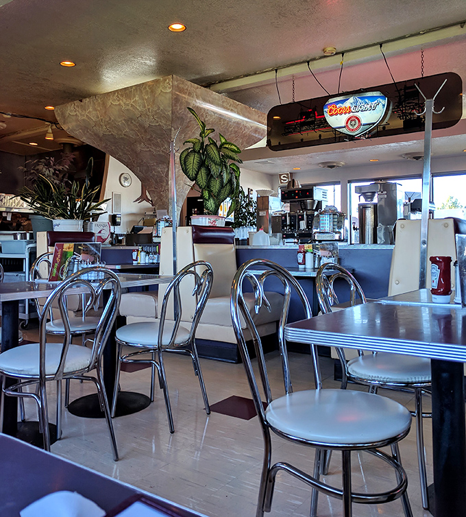 Plants, chrome chairs, and that unmistakable diner ambiance &ndash; a sanctuary for those seeking authentic comfort food.